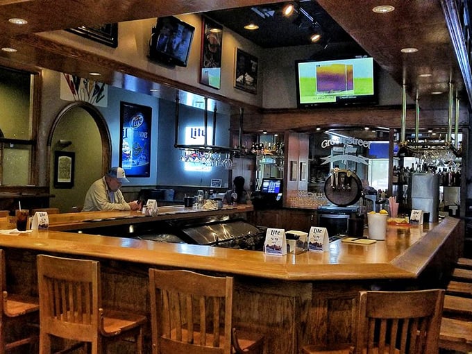 The bar area – where strangers become friends, sports become religion, and "just one more" becomes the evening's mantra.