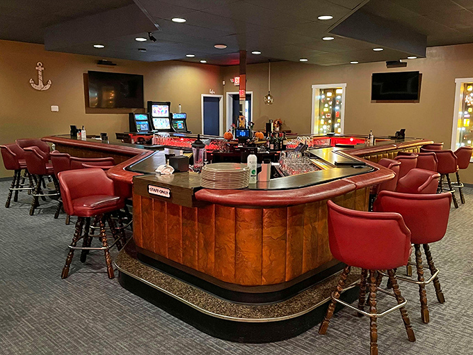 The classic horseshoe bar—where Wisconsin's unofficial sport of pre-dinner cocktailing reaches Olympic levels.