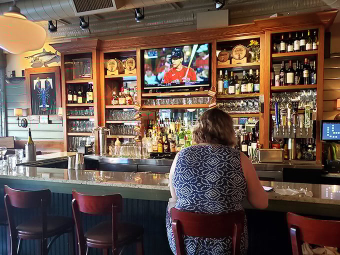 A well-stocked bar with plenty of seating means your wait for a table comes with excellent liquid entertainment options.