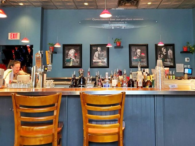 The bar area showcases historical figures watching over patrons, perhaps judging your drink order with the wisdom of centuries.