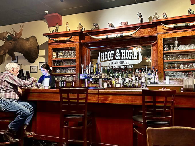 The bar stands ready like a trusty sidekick, offering liquid courage for those attempting the full portion.