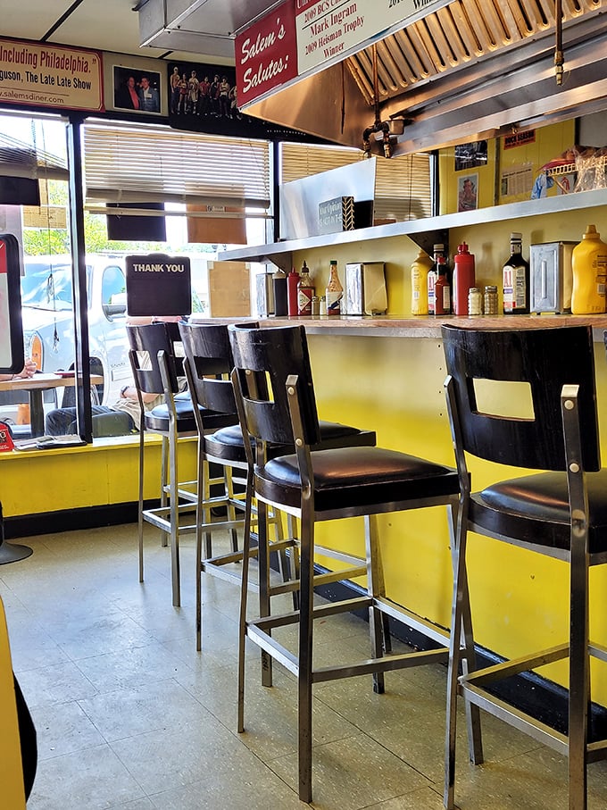 Bar seating that invites solo diners to enjoy the show—watching short-order magic happen is half the entertainment at a great diner.