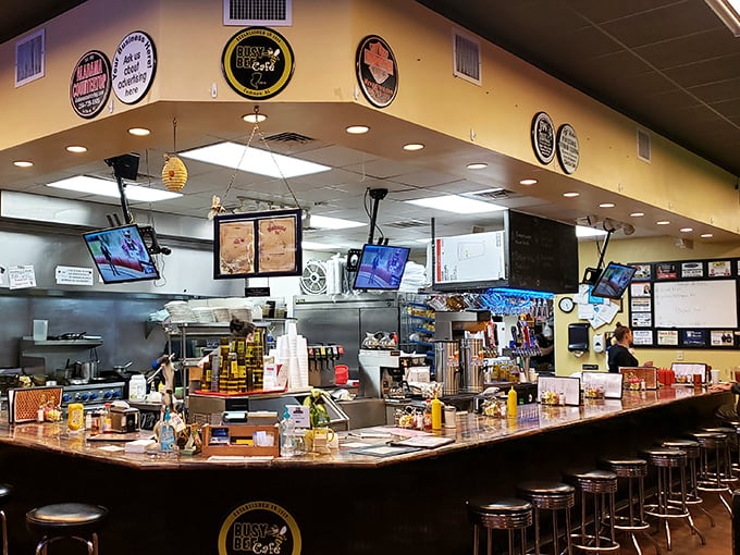 From the counter, you can watch the kitchen ballet—where short-order cooking becomes an art form worthy of standing ovations.