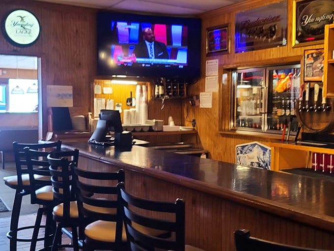 The bar area welcomes solo diners and couples who appreciate that good conversation pairs perfectly with cold beer.