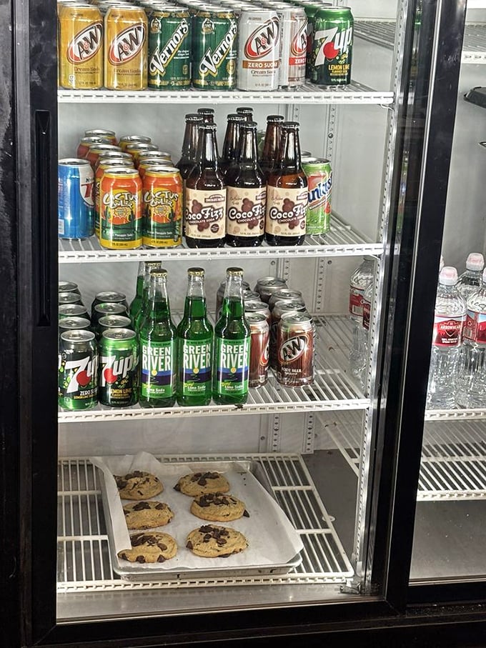 The beverage cooler offers liquid companions for your sandwich journey, plus cookies waiting patiently for dessert consideration.