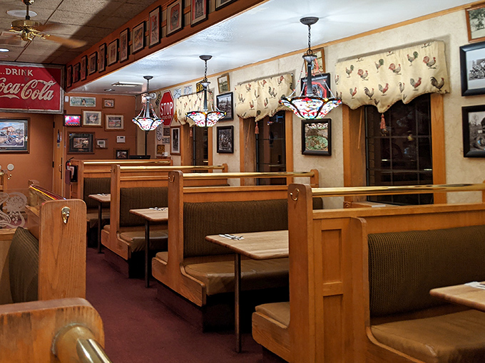 Cozy booths where breakfast dreams come true. Those stained-glass pendant lights have witnessed countless "mmm" moments.
