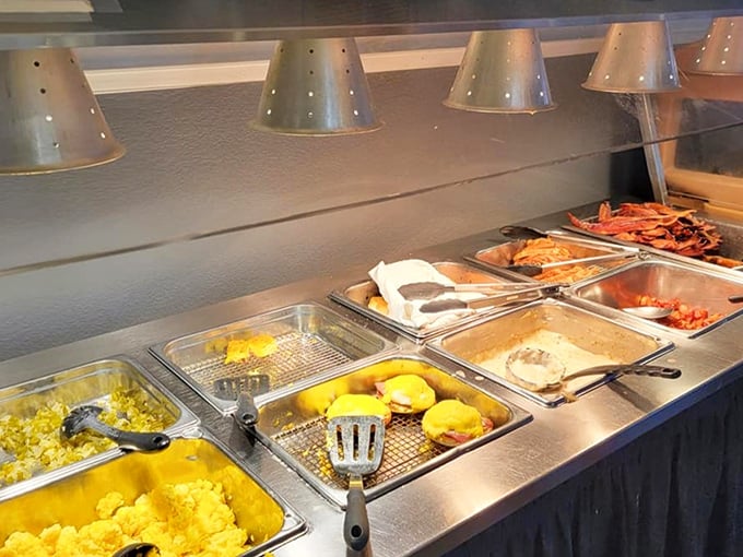 The buffet line—where decisions become deliciously difficult. Those scrambled eggs glow with the promise of farm-fresh goodness.