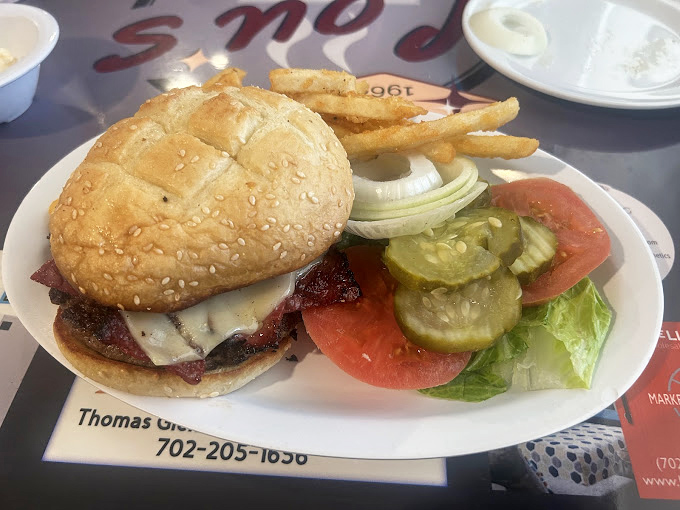This burger doesn't need fancy aioli or artisanal buns – just honest beef, proper toppings, and the satisfaction that comes from food without pretension.