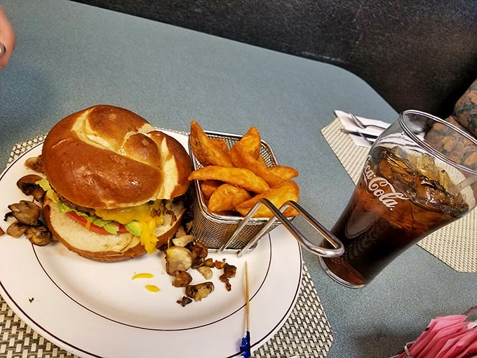 A burger that doesn't need fancy toppings or a clever name—just quality ingredients and proper execution. The fries in their little basket are just showing off.
