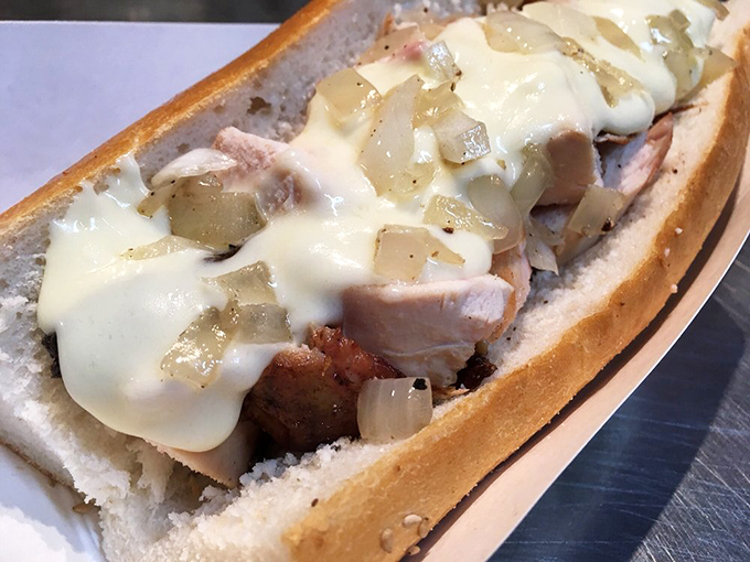 When smoked meat meets melted cheese and caramelized onions, magic happens—the kind that makes you close your eyes and forget your table manners.