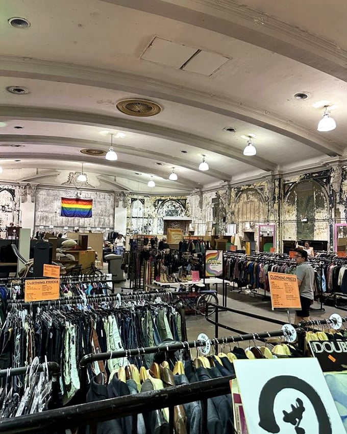 The clothing section stretches beneath elegant arched ceilings—a cathedral of fashion where yesterday's trends await rediscovery.