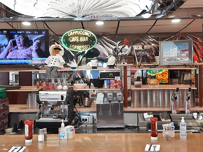 The espresso bar stands ready to transform sleepy patrons into functioning humans—a public service disguised as a coffee station.