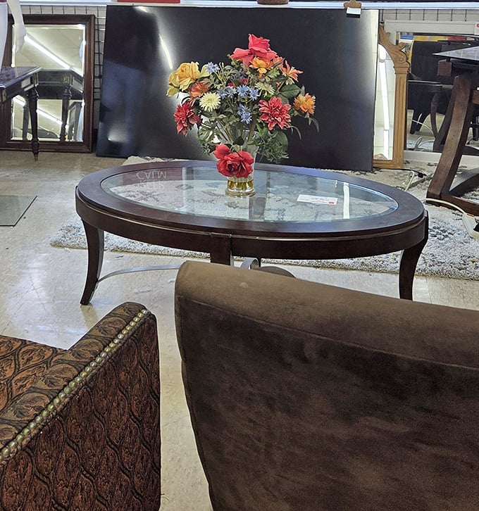 A glass coffee table that's seen more interesting conversations than most therapists. Just add friends and watch the magic happen.