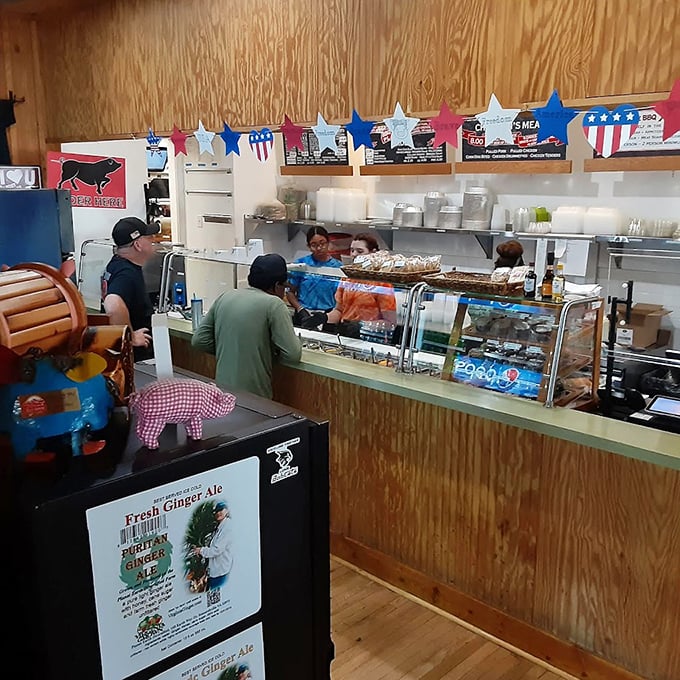 The ordering counter—where barbecue dreams come true. Notice the pig decorations; they know their audience well here.