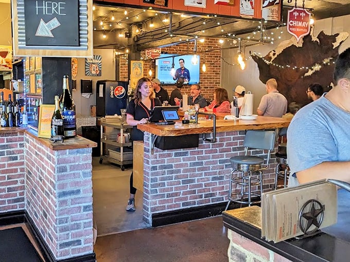The bar area – where strangers become friends united by the universal language of "Did you try the brisket yet?"
