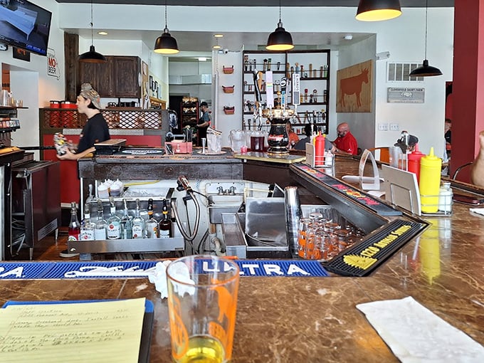 Behind the counter is where the magic happens – a glimpse into the organized chaos that produces burger perfection.