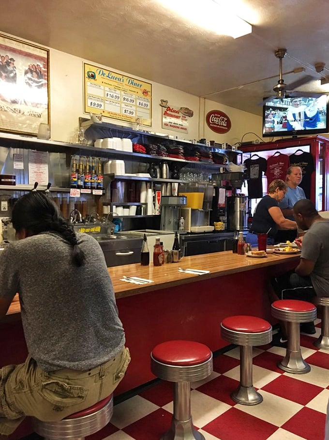The counter at DeLuca's—where strangers become neighbors, coffee cups are always full, and breakfast dreams come true.
