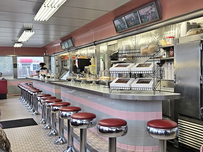 The counter with its row of red stools invites solo diners to perch and watch the short-order ballet unfold – breakfast choreography at its finest.