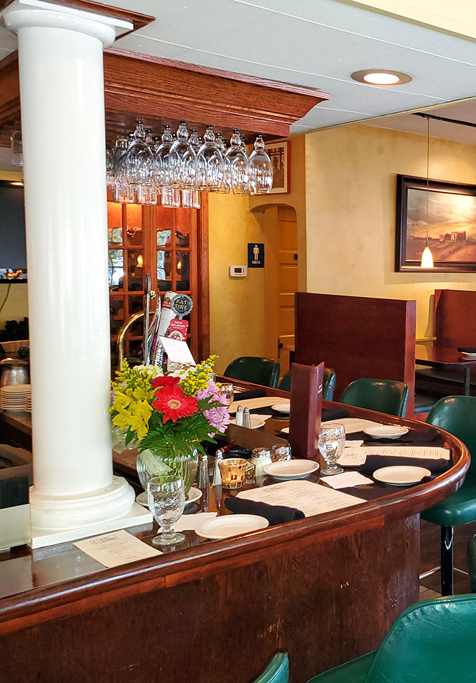 Fresh flowers, elegant glassware, and comfortable seating at the bar – where solo diners become part of the Colao's family.
