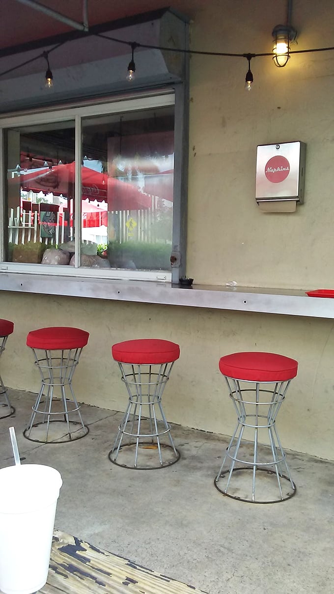 The ordering window—where dreams are shared and hot dogs are born. A humble portal to extraordinary flavor.