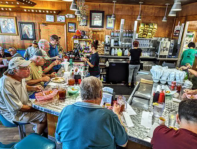 The counter seats offer front-row views to barbecue theater, where regulars and staff exchange the day's news between bites.