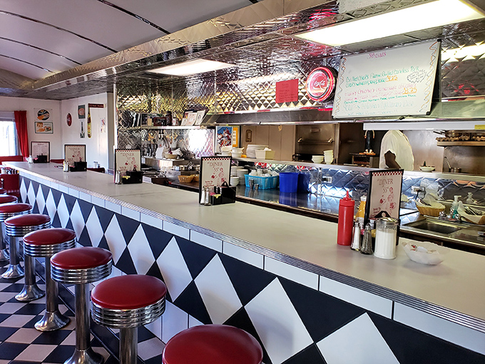 The counter isn't just for dining; it's front-row seating to the short-order ballet, where regulars are known by name and order.