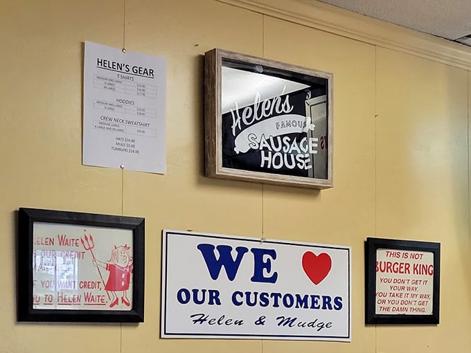 Wall art that tells you everything you need to know: "We ❤️ Our Customers" and "This is Not Burger King"—honesty in advertising at its finest.