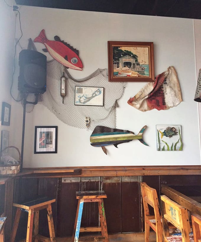 The wall décor strikes that perfect balance between "authentic fishing village" and "we actually know what we're doing with seafood."