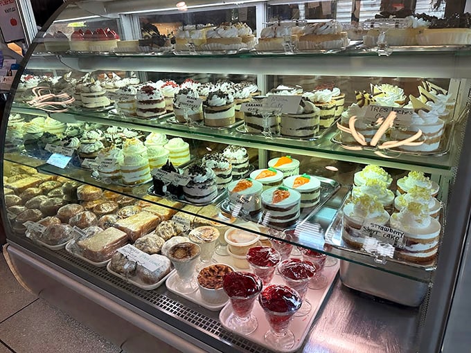 The dessert case at Suburban Diner isn't just a display—it's a museum of temptation where willpower goes to die and "I'll just have coffee" becomes "and a slice of that."