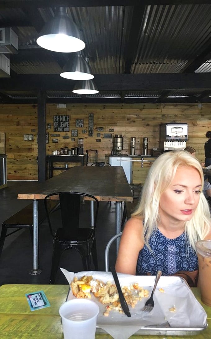 The dining area features communal tables where strangers become friends, united by the universal language of "mmm" and "you've got to try this."