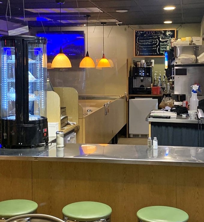 Behind the scenes magic happens here, where pendant lights cast a warm glow over the workspace where breakfast dreams become reality.