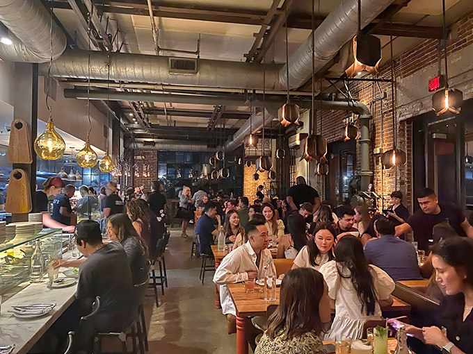 When night falls, Bestia transforms into LA's liveliest dinner party—where strangers become friends over shared plates and wine-fueled laughter.