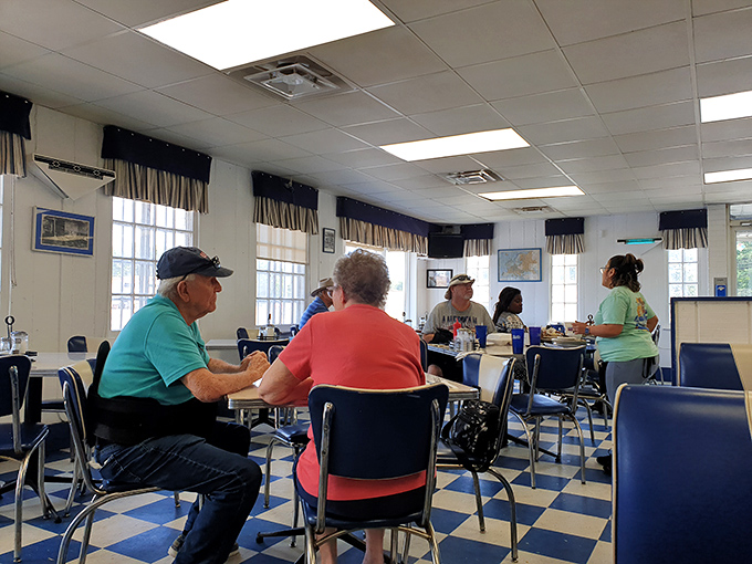The real heart of any great restaurant—locals gathering around tables, sharing stories and meals in equal measure.