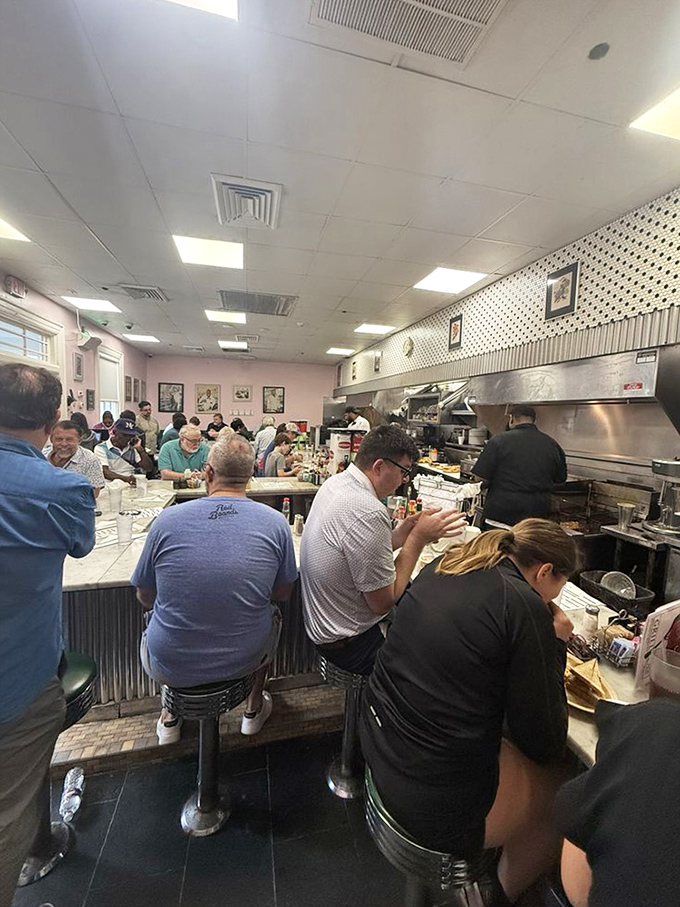 The counter at Camellia Grill isn't just seating—it's a community table where strangers become friends over shared love of perfectly flipped omelets.