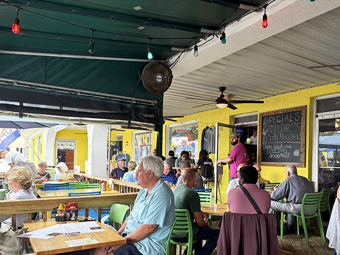 The outdoor dining area buzzes with conversation and laughter—the soundtrack to every great meal at Woody's.