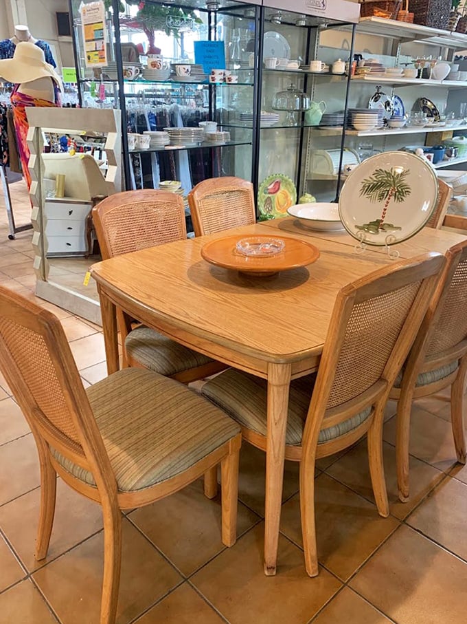 This dining set isn't just furniture—it's an invitation to gather. That palm tree plate is practically begging to serve key lime pie.