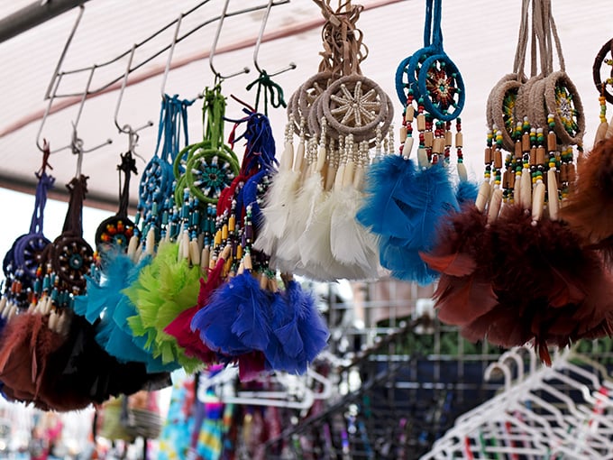 Dreamcatchers dancing in the market breeze – part folk art, part spiritual tool, and entirely mesmerizing as they twirl above the shoppers.