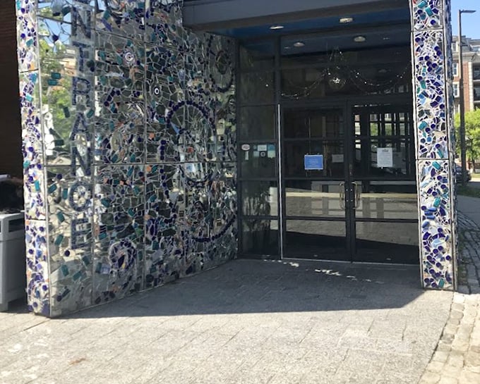 The museum entrance feels like stepping through a portal. Those mosaic patterns aren't just decoration—they're an invitation to see differently.