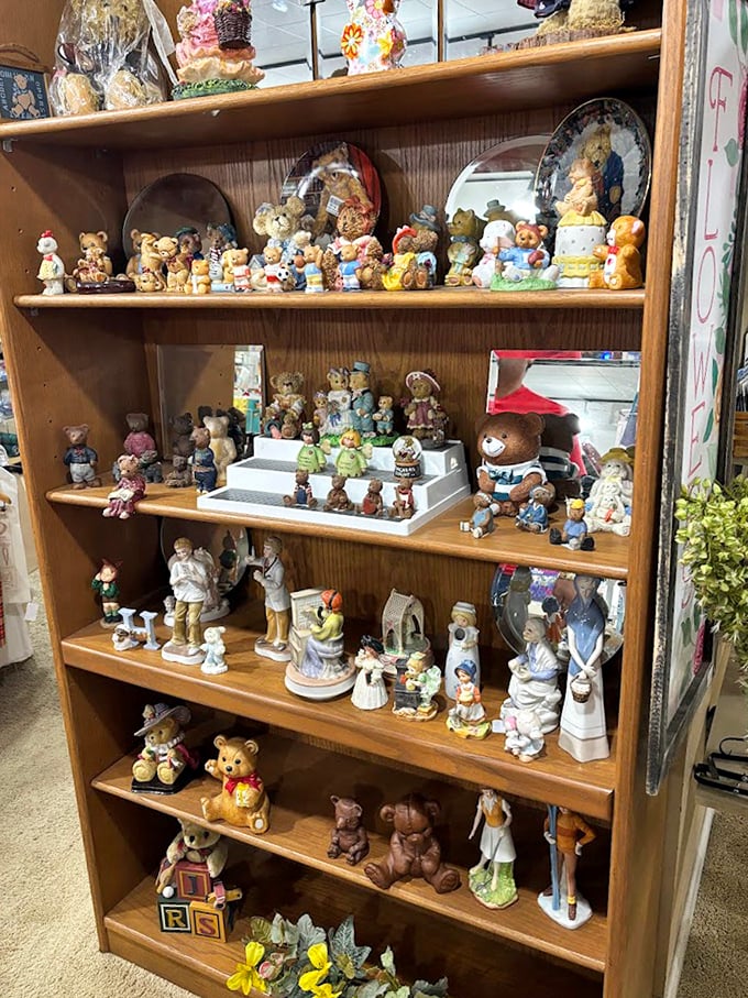 An army of figurines stands at attention, each tiny face telling a story of mantelpieces past and curio cabinets future.