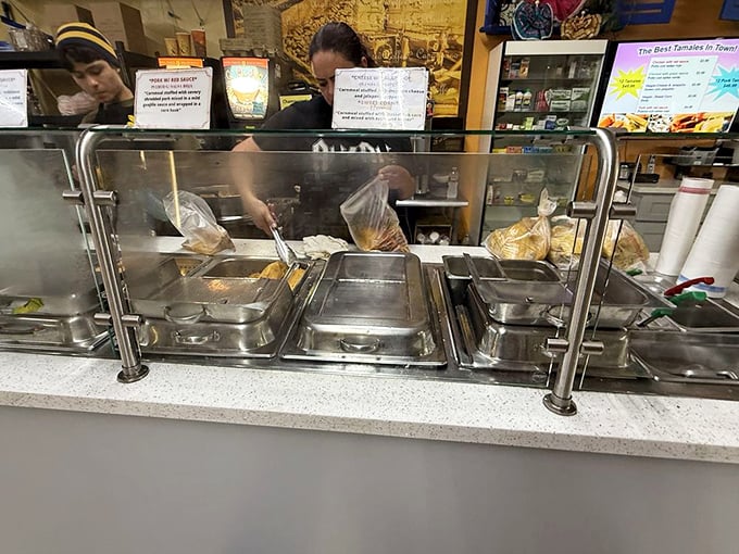 Where the magic happens – steam rising from fresh tamales being packaged reminds us that some of life's greatest pleasures come wrapped in simplicity.