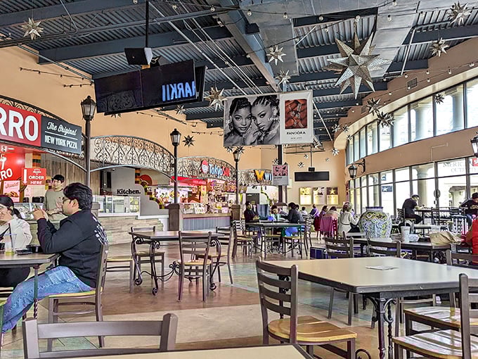 The food court's star-studded ceiling and New York pizza counter – because marathon shopping requires serious carb loading.
