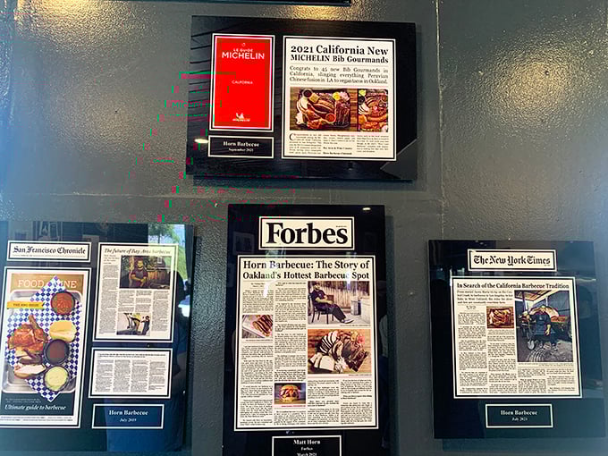 Those framed articles are the paper trail of culinary fame—like gold records for rock stars, except you can eat the hits.