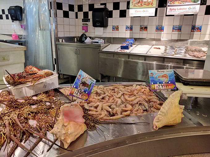 The fish market display—where today's catch becomes tonight's masterpiece, no frequent flyer miles required for this seafood.