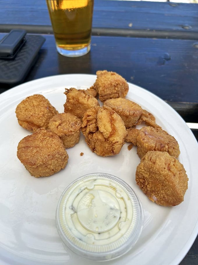 These golden-fried scallops are the candy of the sea—sweet, tender morsels that disappear faster than your willpower around them.
