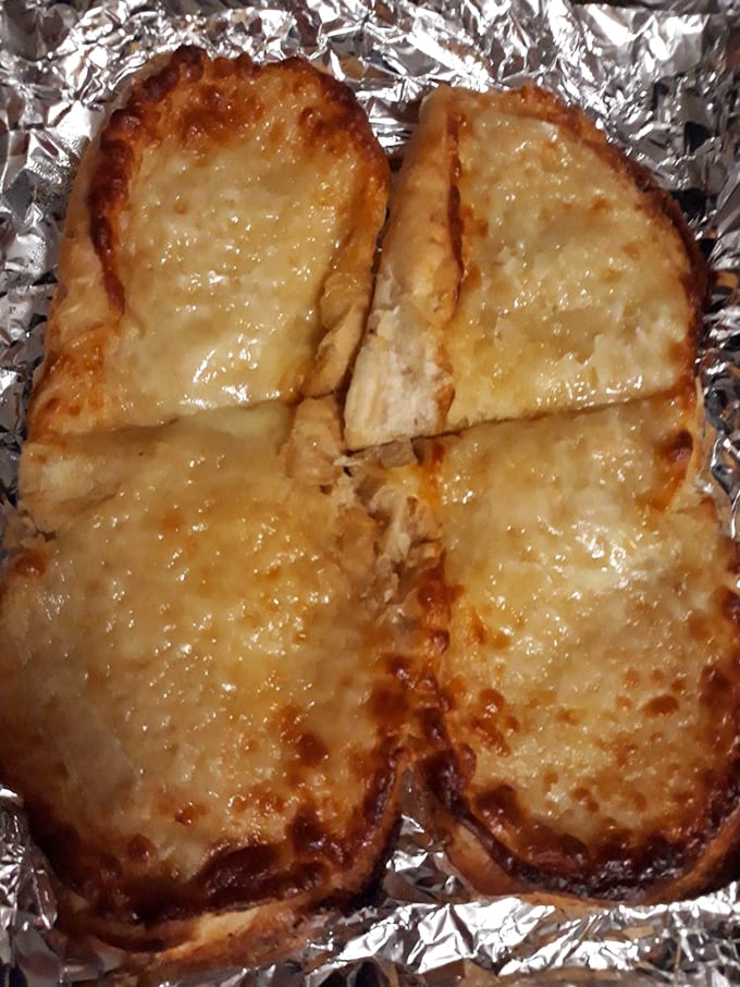 Garlic bread masquerading as pizza, or pizza pretending to be garlic bread—either way, you win gloriously.