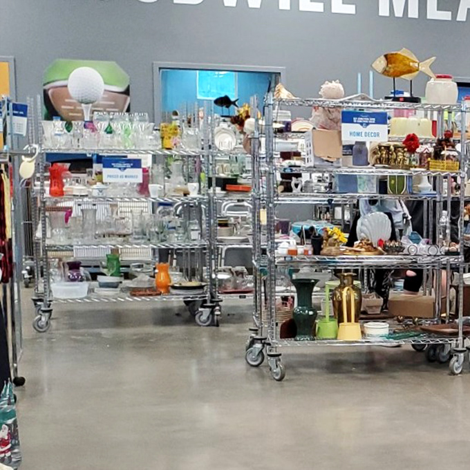 The home decor section resembles an archaeological dig through America's decorating phases—each shelf a different era, each item a conversation starter.