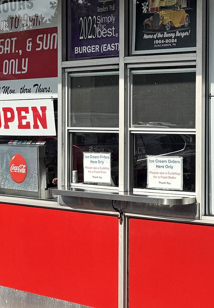 The ice cream window—where summer dreams are served one scoop at a time. Worth the separate trip from your burger order.