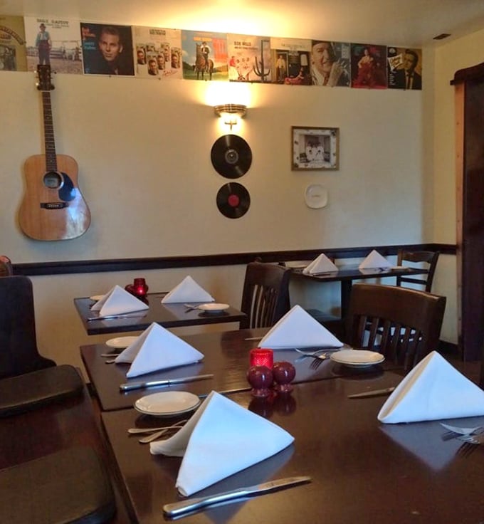 Vinyl records and acoustic guitars on the wall—because great meals, like great songs, stay with you long after the last note.