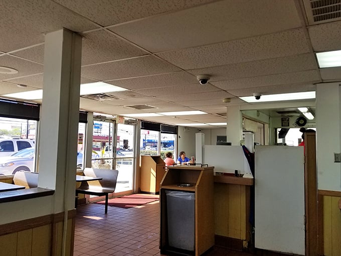 Where locals gather for their burger fix. That wood paneling has absorbed decades of satisfied sighs and "mmms" from happy diners.