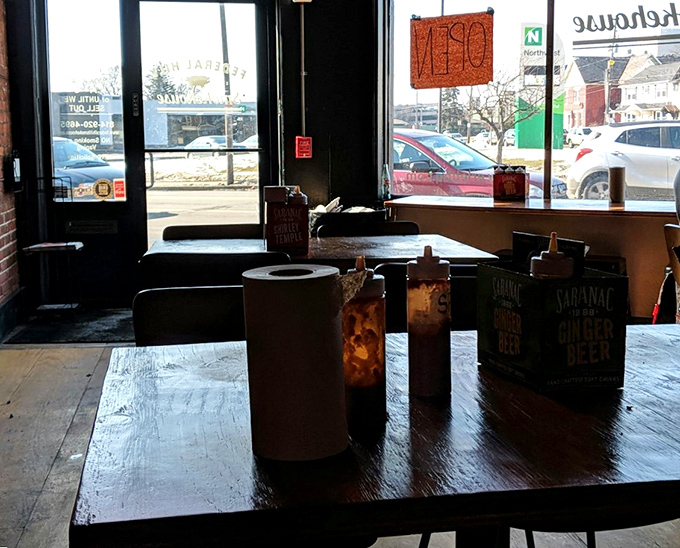 The view from inside offers a glimpse of Erie beyond, but the real journey happens on your plate, one bite at a time.